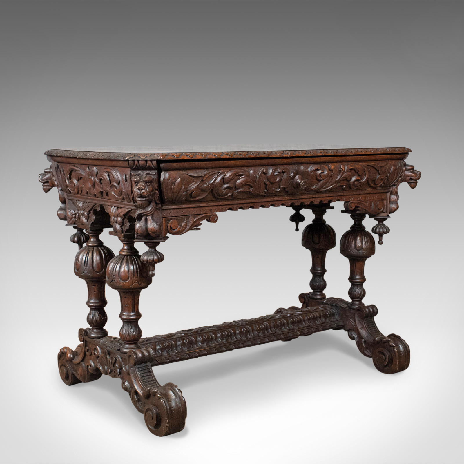 1800's wood table with ornate carvings (lion head, green man, a drawing ...