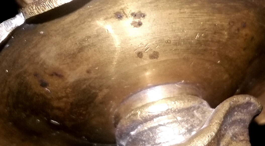 Dark spots on bronze | Antiques Board
