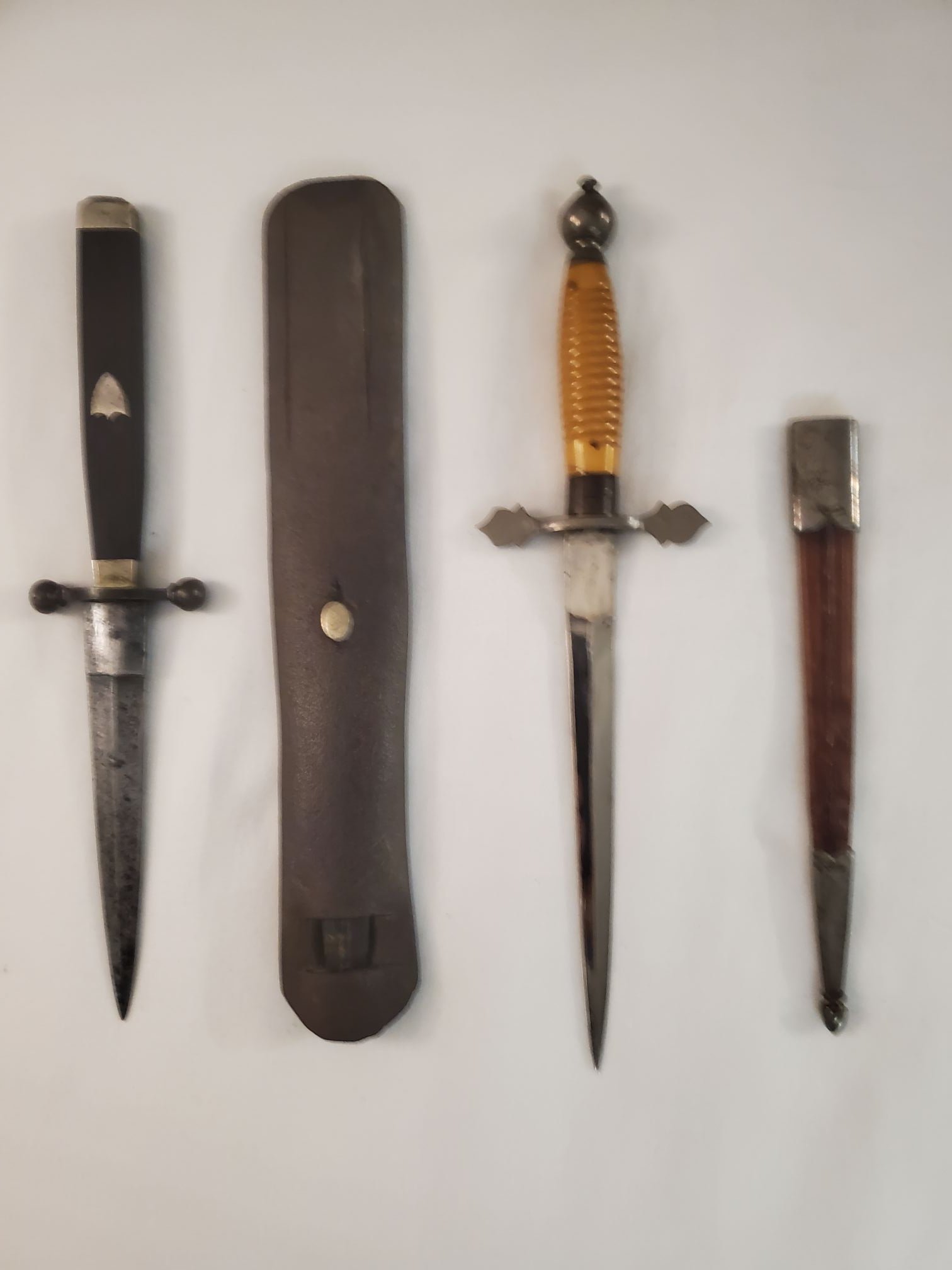 Help with identifying 2 small daggers | Antiques Board