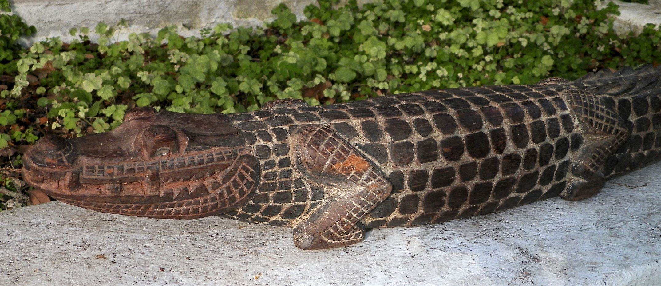 Cool carved wood alligator folk art? Carved symbol artist's signature ...