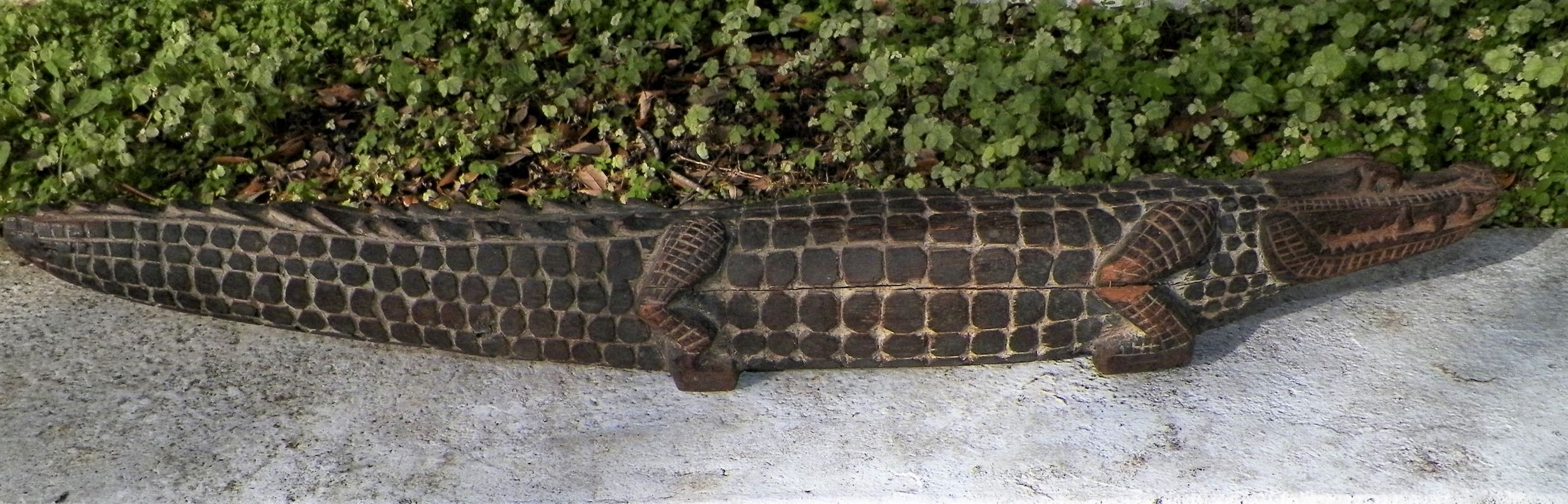 Cool carved wood alligator folk art? Carved symbol artist's signature ...