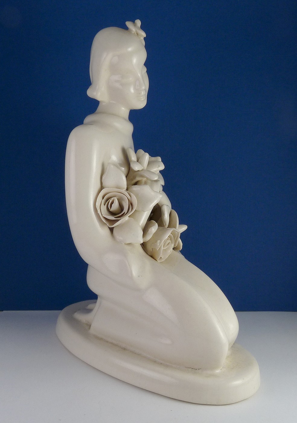 Looking for Maker of Deco Kneeling Woman with Flowers Figurine ...