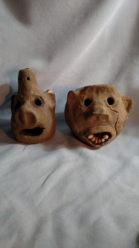 Primitive Clay Head Sculptures with Shell Teeth - What Do I have ...