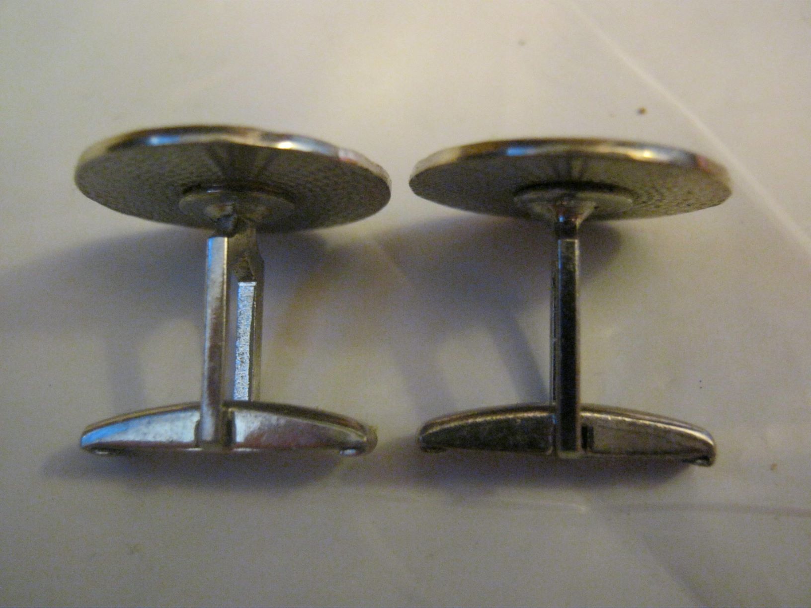 Pair of chromed round cuff links | Antiques Board