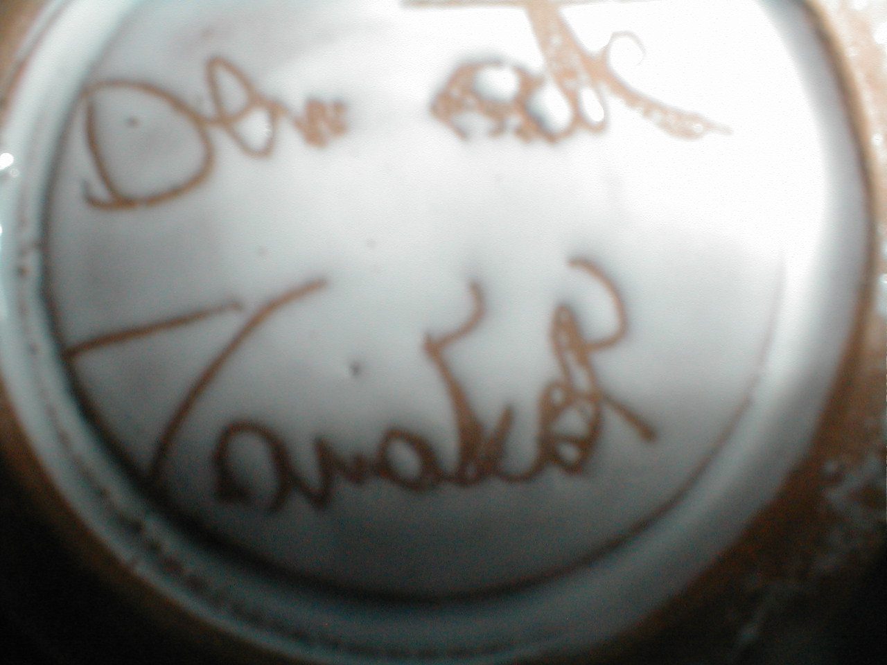 Can you decipher the signature on the bottom of this little vase? TIA ...