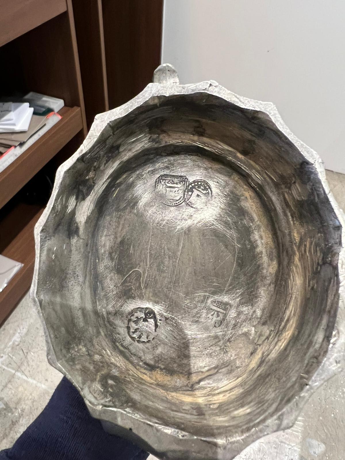 Where is this pot from, what is its material and what is it for ...