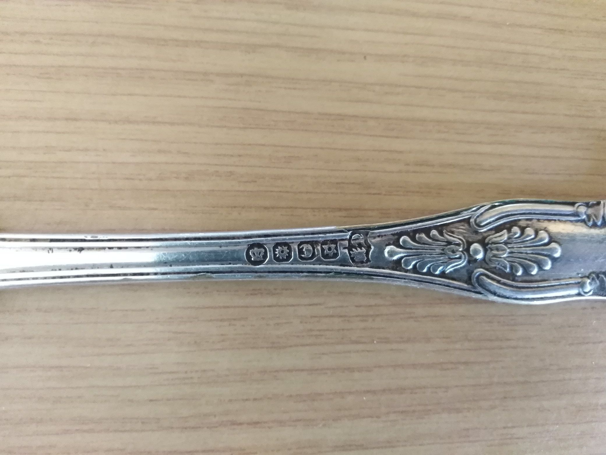 Maker's mark on Spoon. Crown, moon, sun, stars. Sheffield? German ...